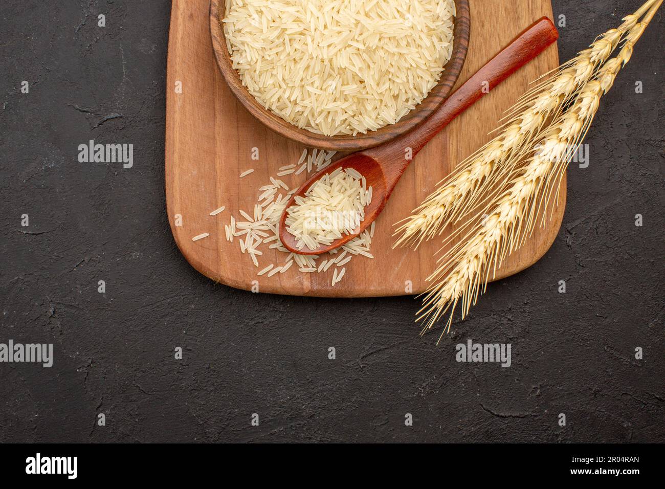 top view raw rice inside plate on grey background rice raw meal food ...