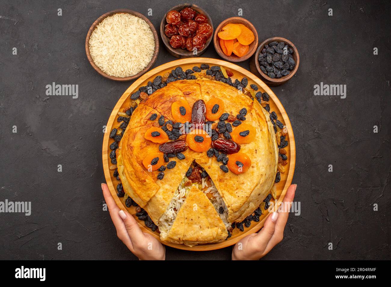 top view shakh plov delicious rice meal cooked inside round dough with ...