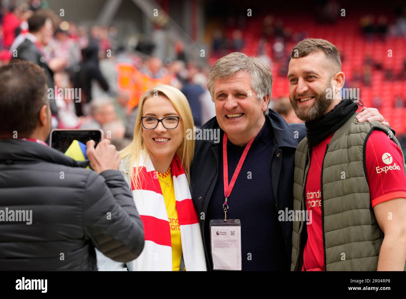 Former Liverpool player Jan Molby poses for a photo with fans before ...
