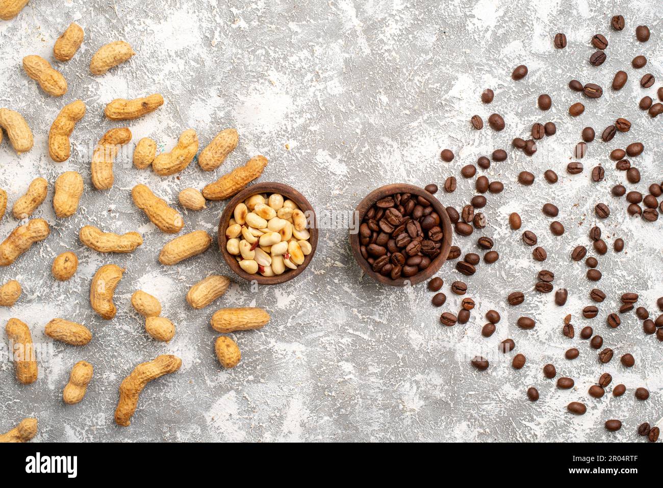 top view tasty peanuts with brown coffee seeds on white background many ...