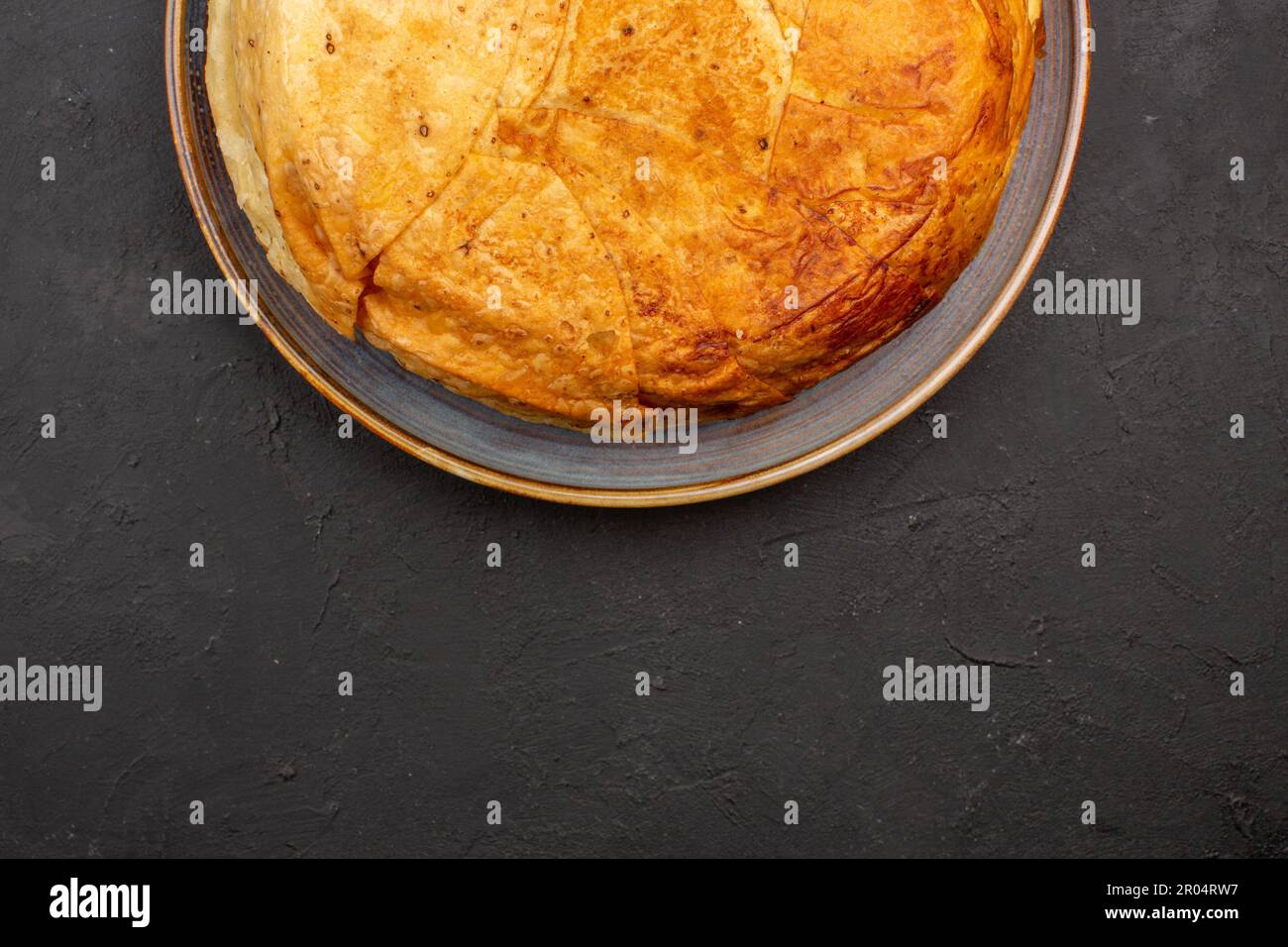 top view tasty shakh plov cooked rice inside round dough on grey ...