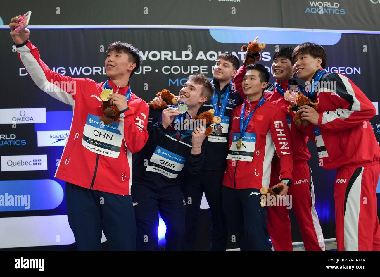 From left to right, gold medal winner Long Daoyi, of China, takes a ...