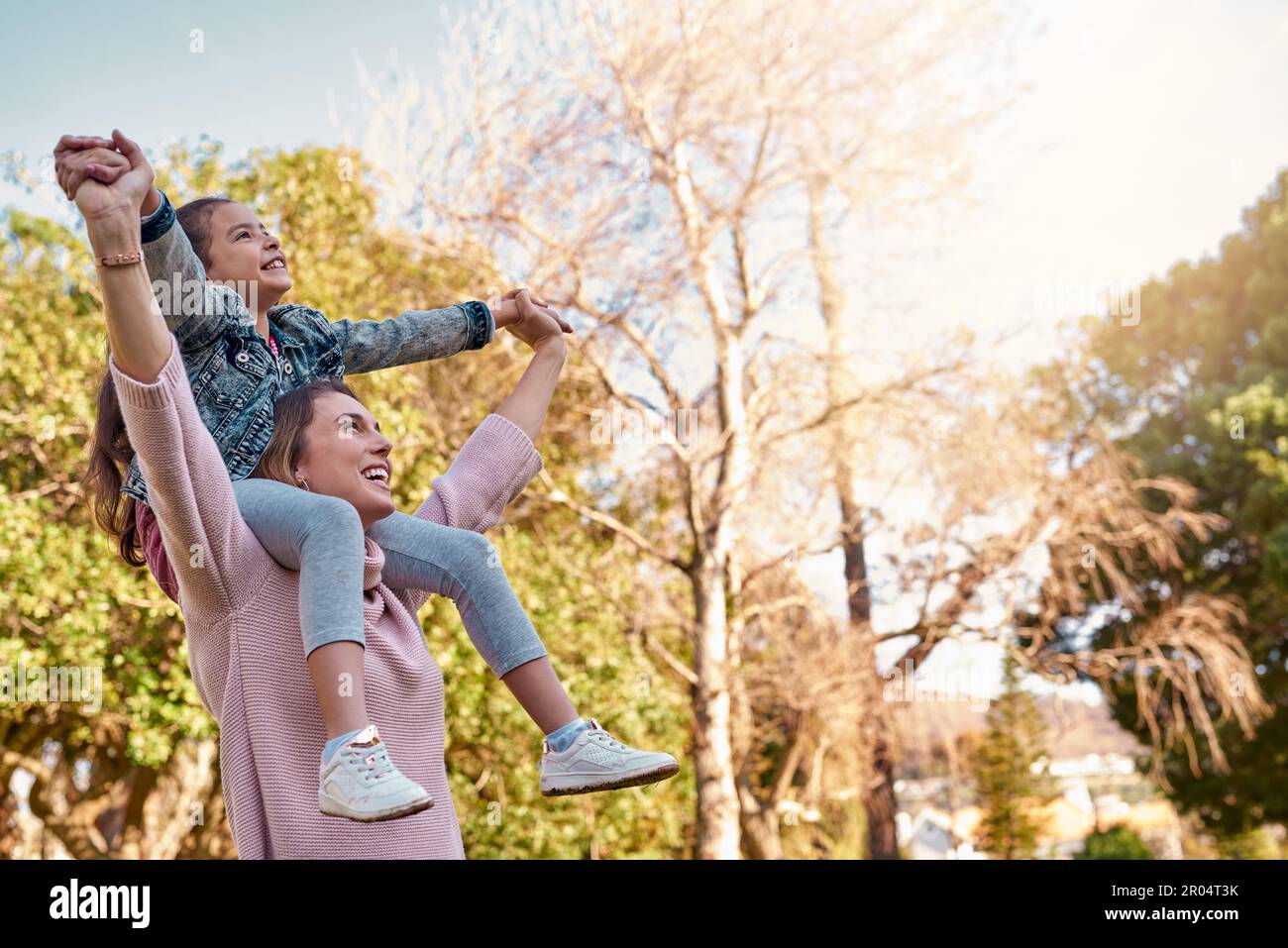 Strong women raise strong daughters. an adorable little girl having fun ...
