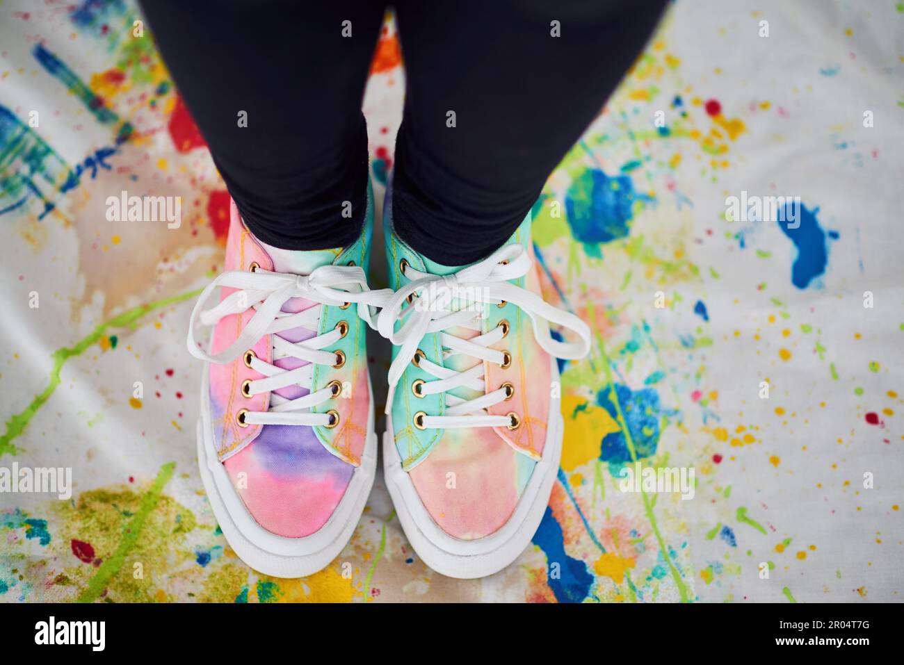 Living life in color. an unrecognizable woman standing with colorful ...
