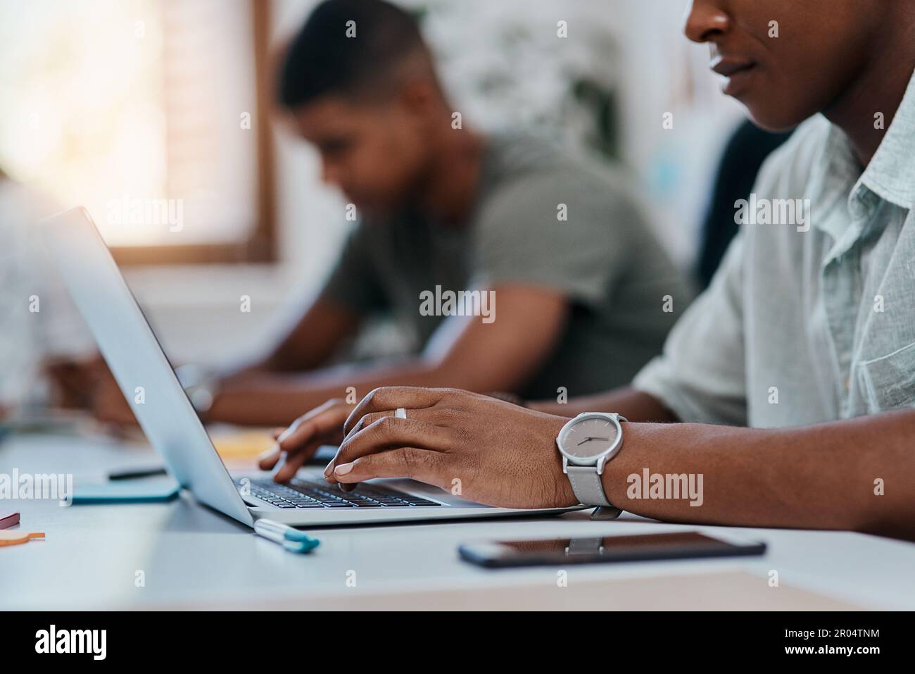 Wireless tech gets the work done. a businessman using a computer in a ...