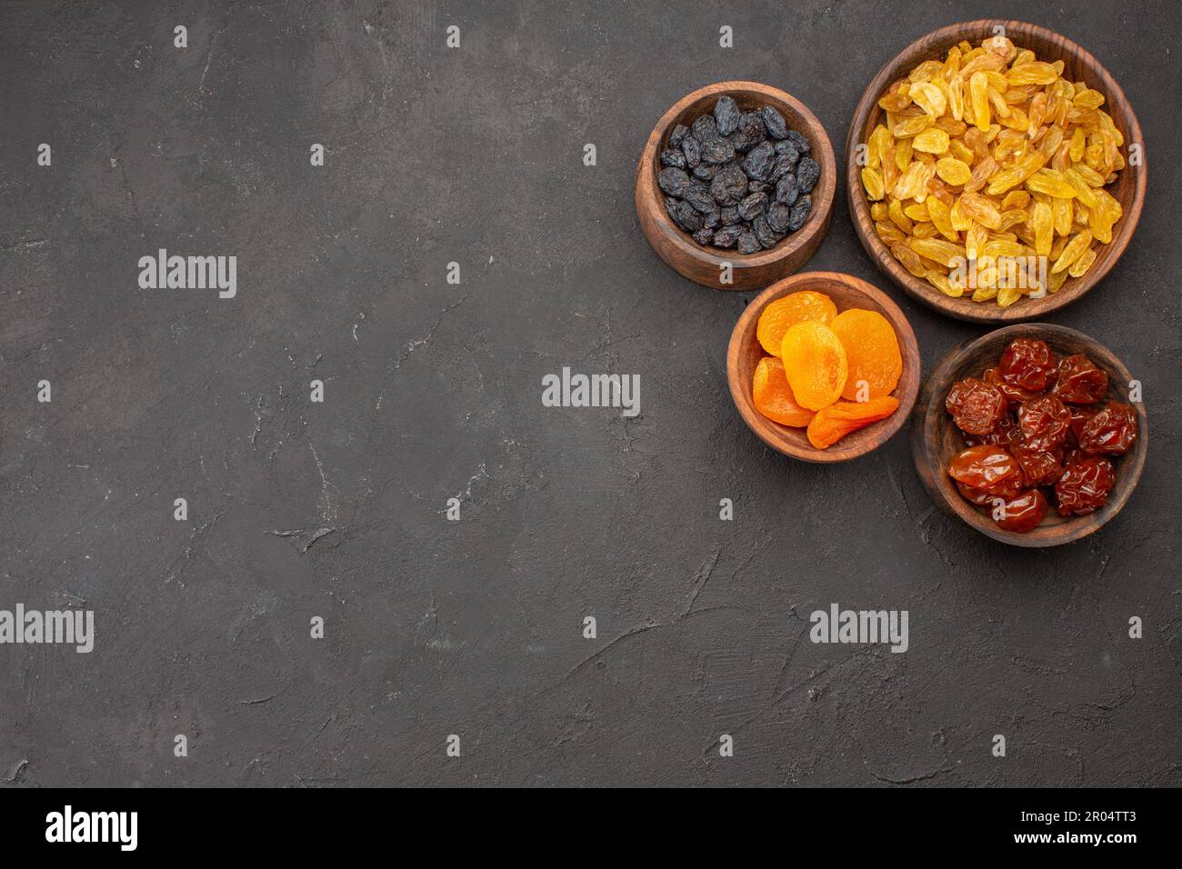 top view dried raisins inside little pots on grey background raisin dry ...