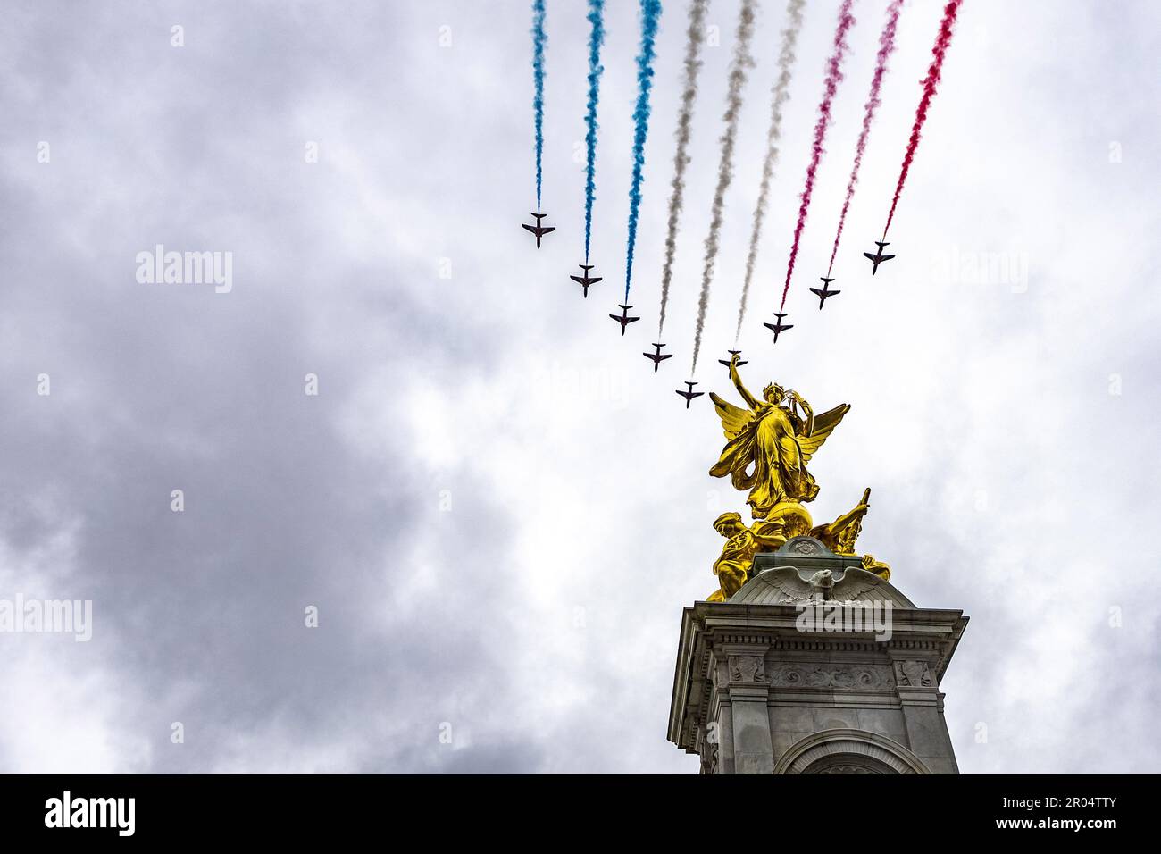 The Red Arrows fly over London, following King Charles III and Queen ...