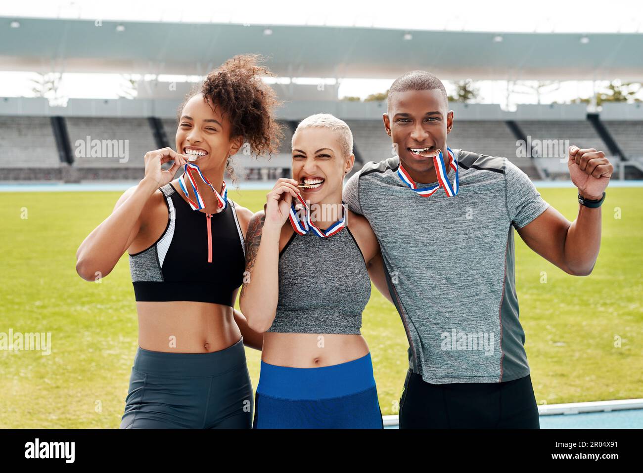 Gold for the win. Cropped portrait of a diverse group of athletes ...