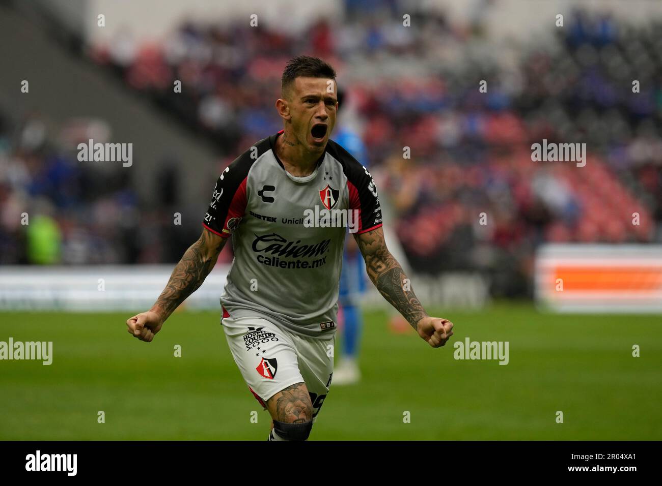 Brian Lozano of Atlas celebrates after scoring the opening goal against ...