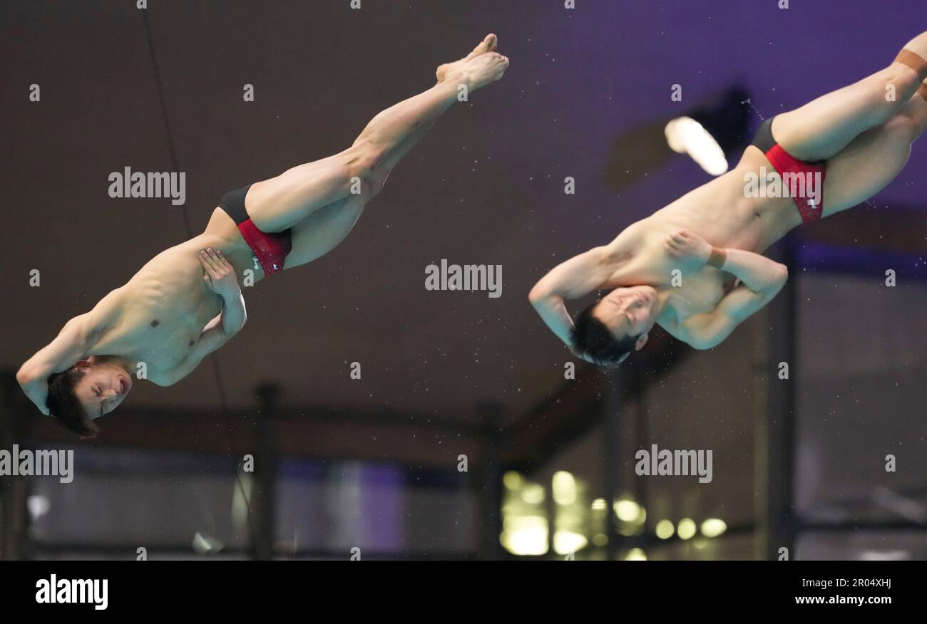 Long Daoyi and Wang Zongyuan, of China, compete to a gold medal in the men's 3-meter ...