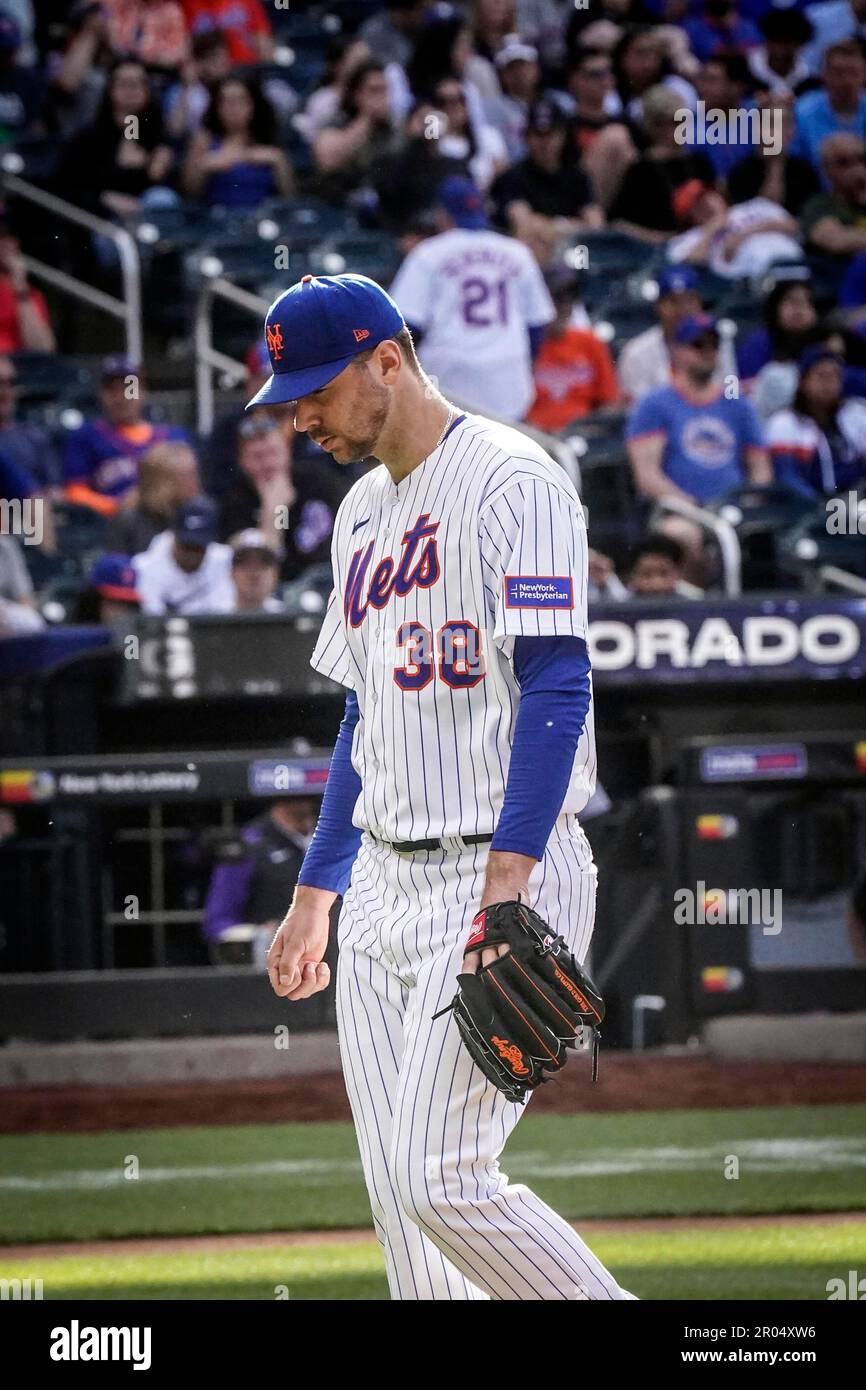 New York Mets pitcher Tylor Megil walks off the field after being ...