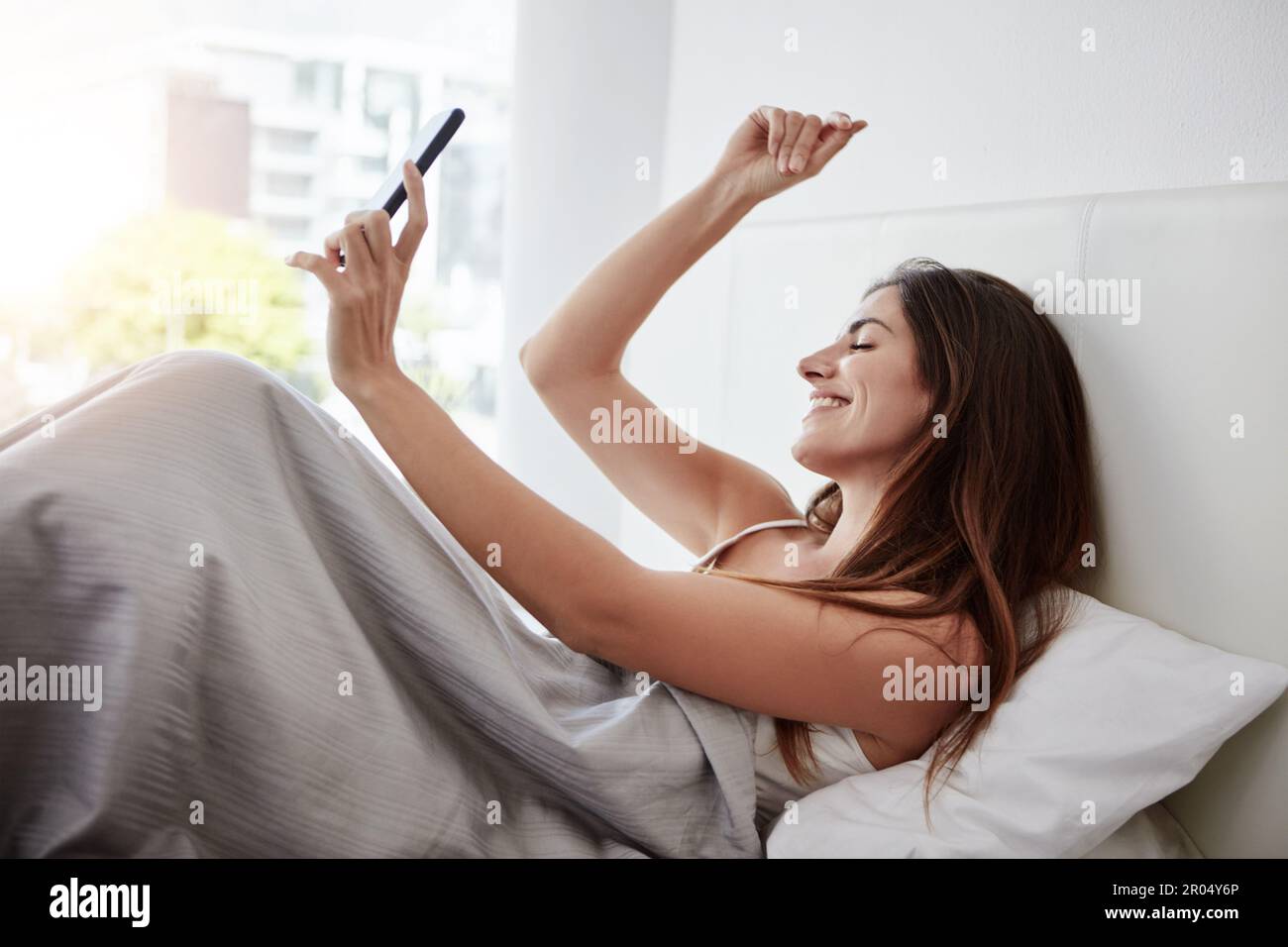 Start your day with a positive attitude. a beautiful young woman ...