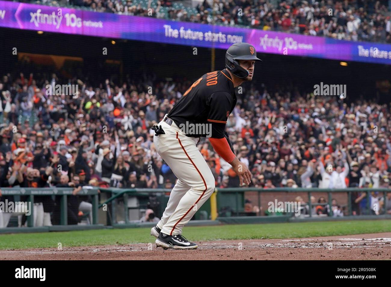 San Francisco Giants' Michael Conforto scores against the Milwaukee ...