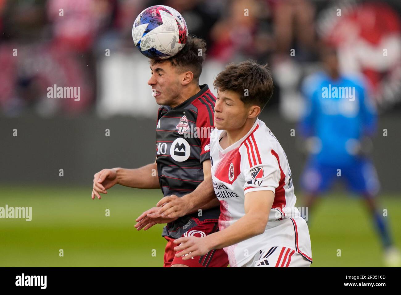 Toronto FC midfielder Kobe Franklin (19) and New England Revolution ...