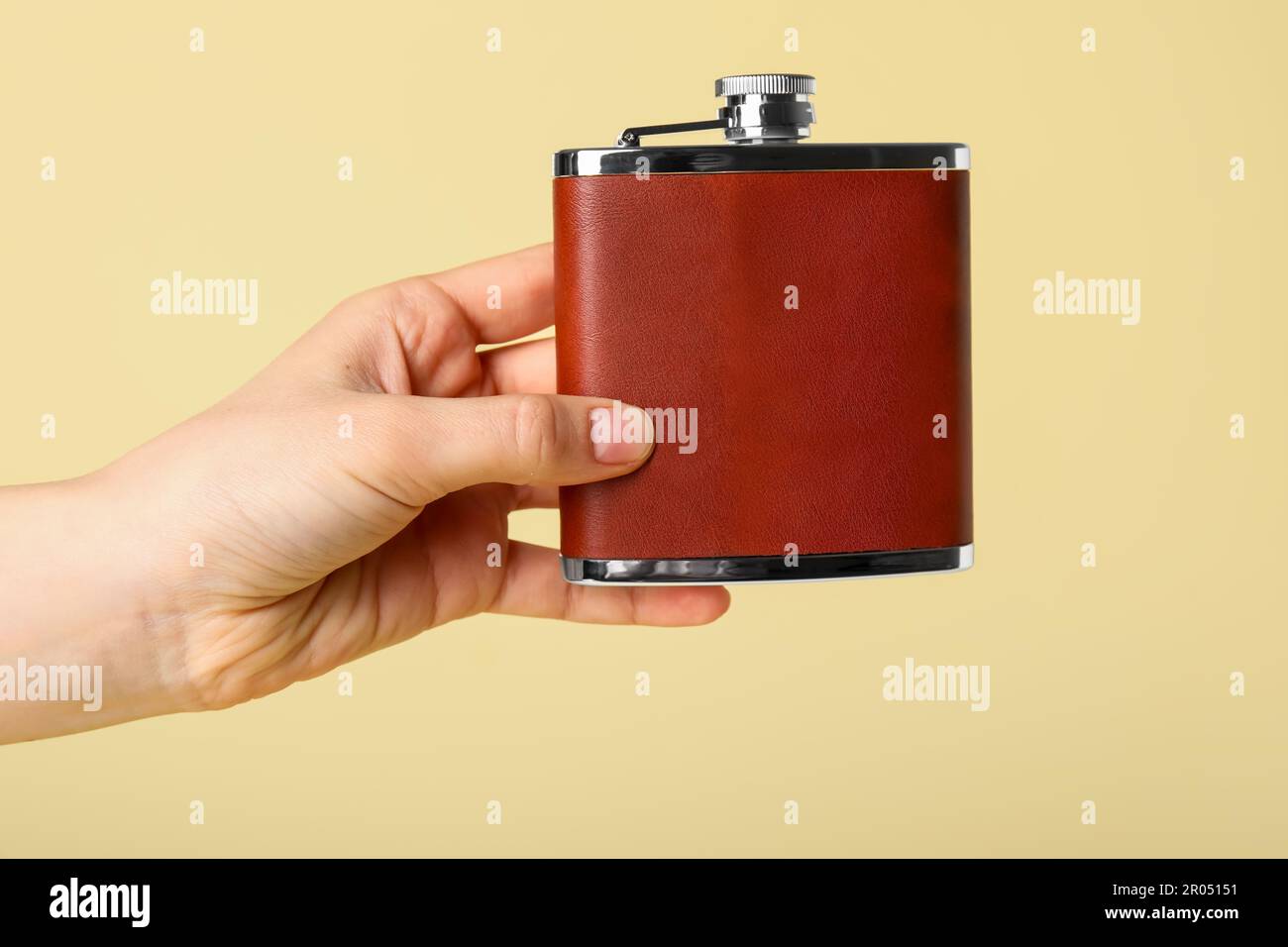 Male hand holding hip flask hi-res stock photography and images - Alamy