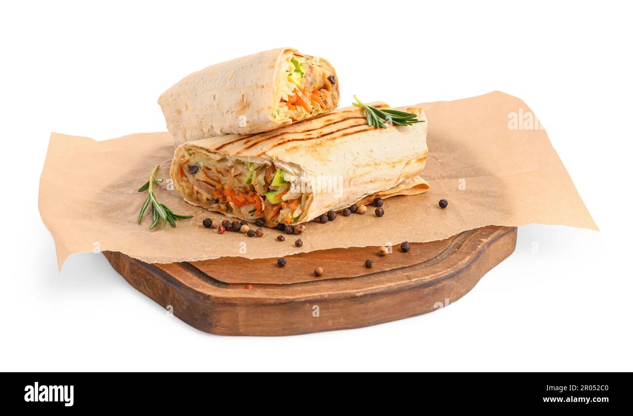 Board of baking paper with tasty shawarma on white background Stock ...