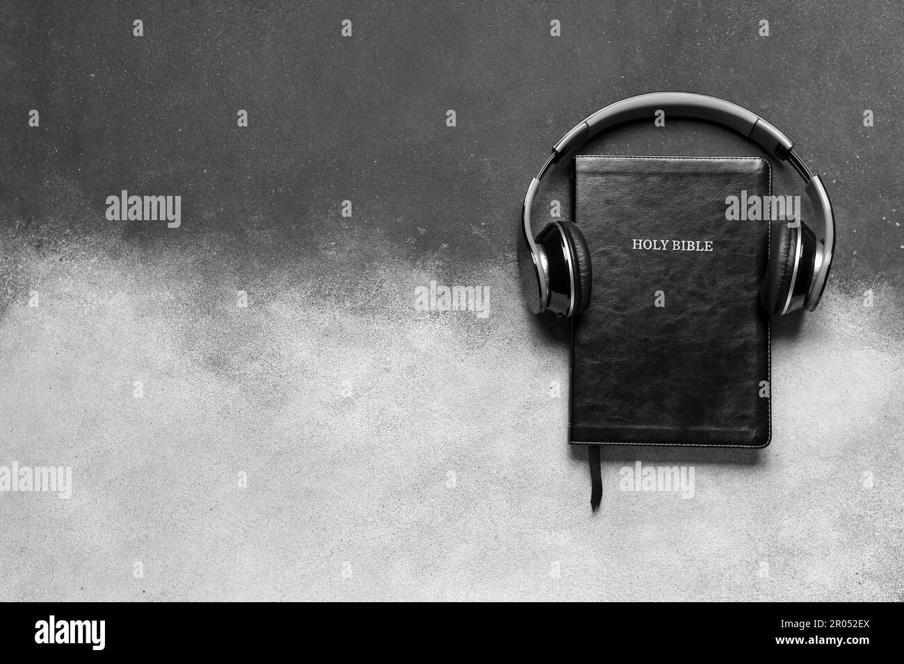 Holy Bible with headphones on grunge background Stock Photo - Alamy