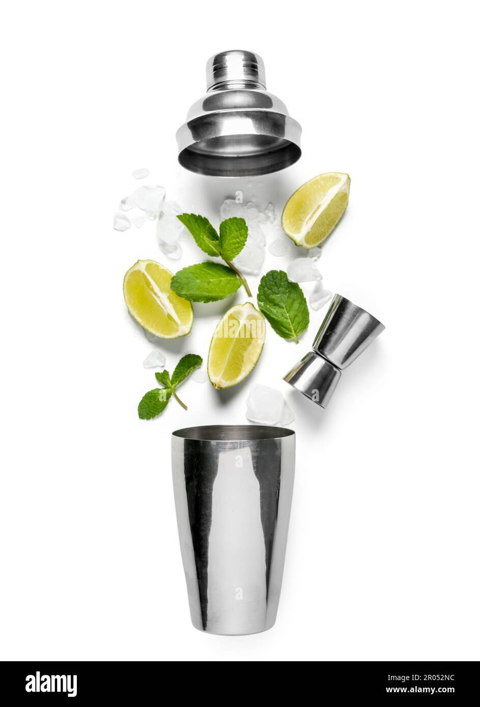 Shaker, measure cup and ingredients for preparing mojito on white ...