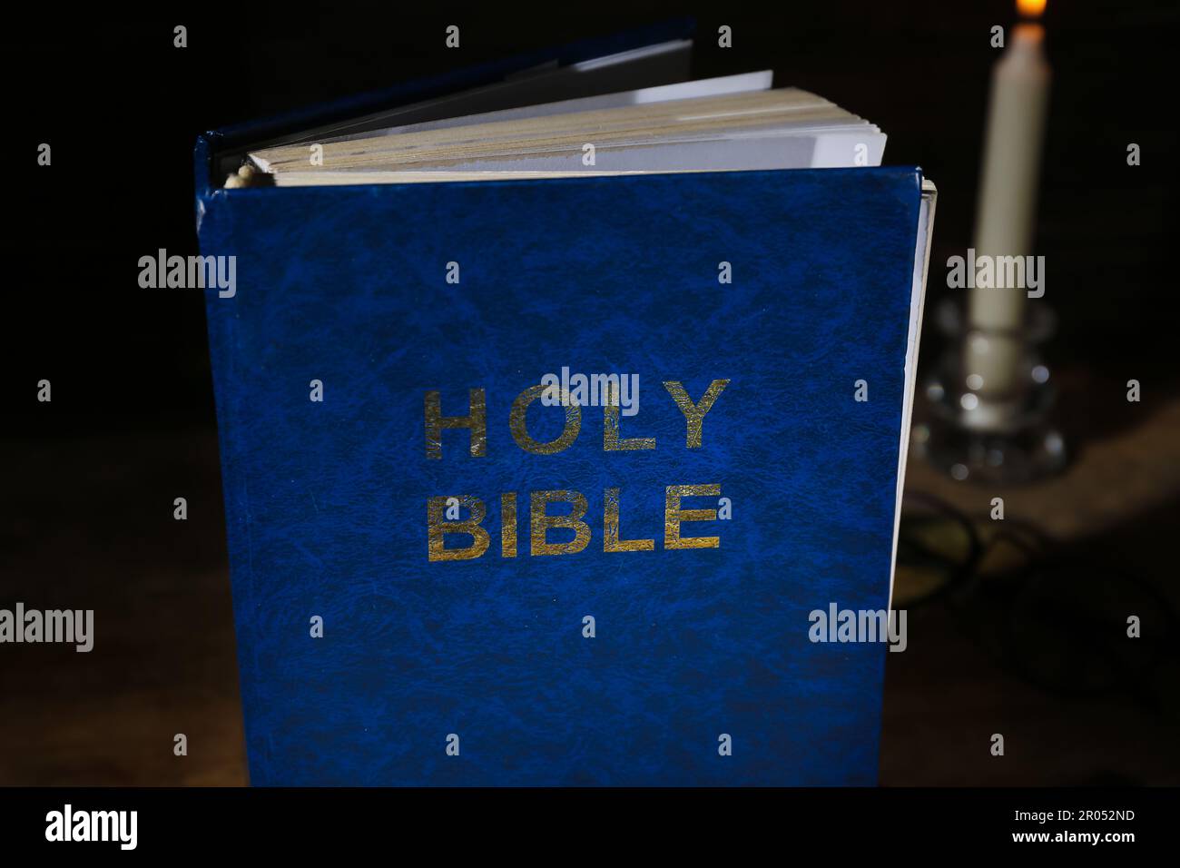 Holy Bible on dark background, closeup background Stock Photo - Alamy