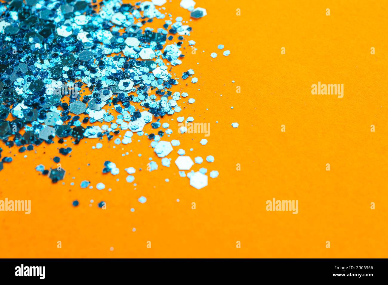 Orange And Blue Glitter Background