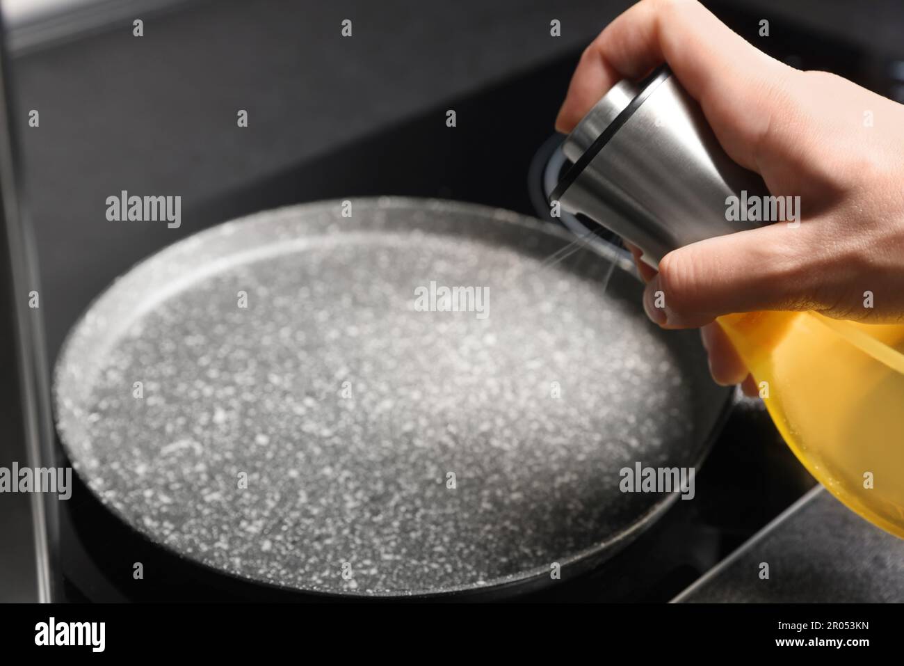 Spraying oil hi-res stock photography and images - Alamy