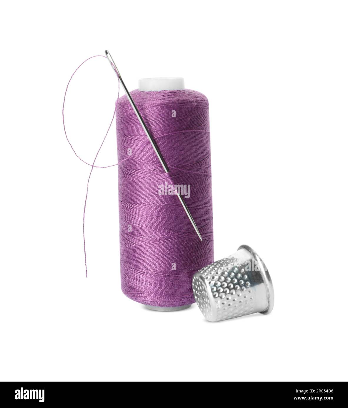 Spool of thread and sewing tools on white background Stock Photo - Alamy