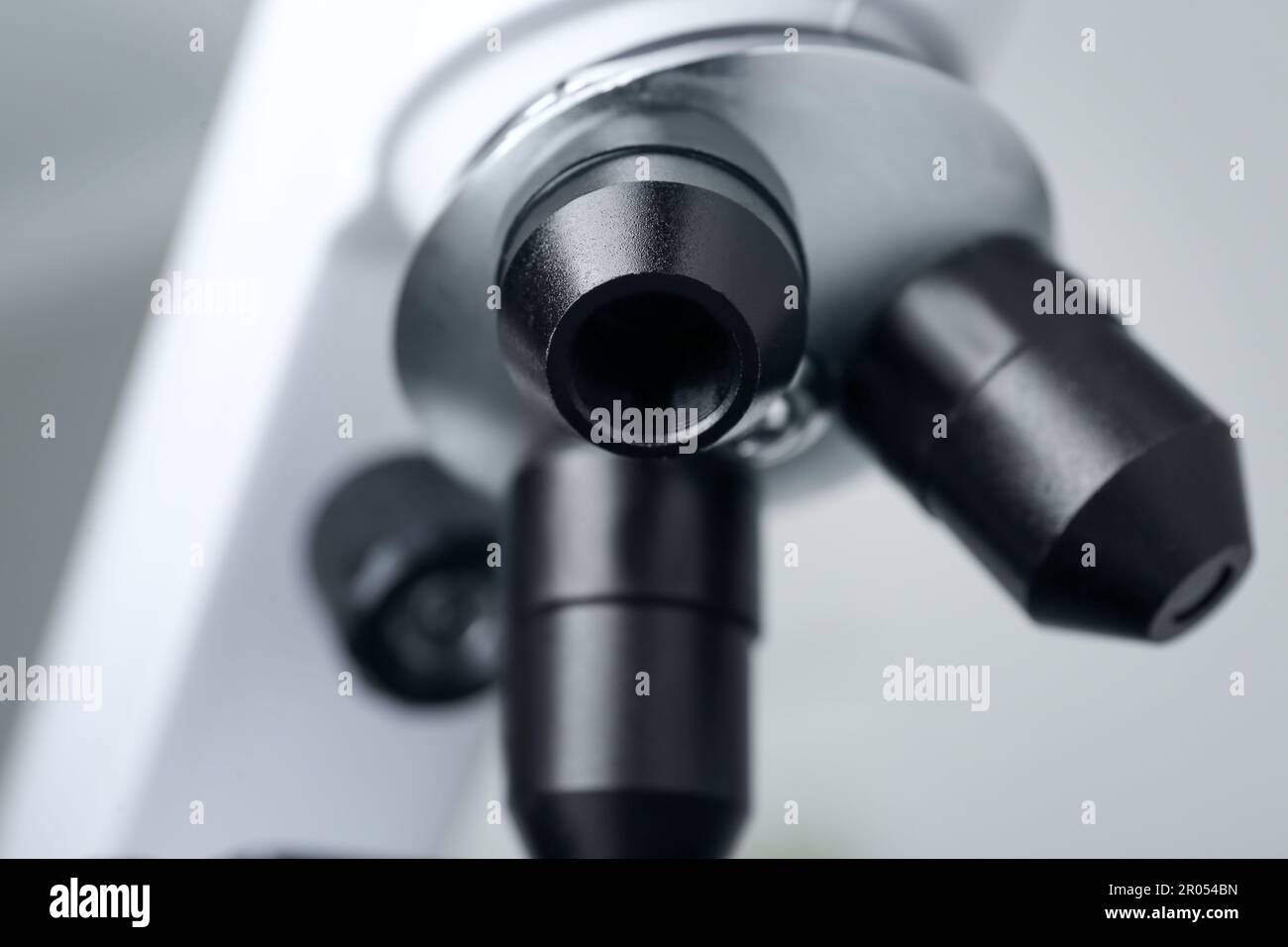 Closeup view of modern medical microscope on grey background Stock ...