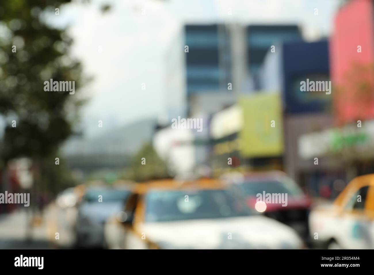 Blurred view of city street with cars Stock Photo - Alamy