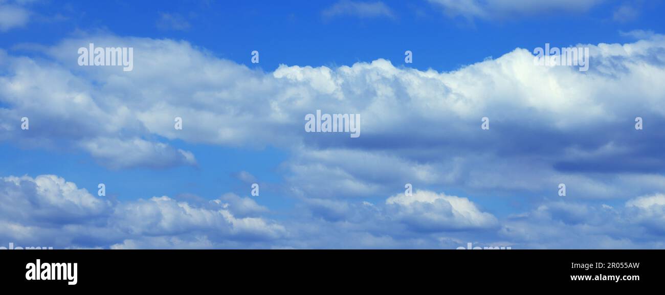 Beautiful blue sky with white fluffy clouds. Banner design Stock Photo ...