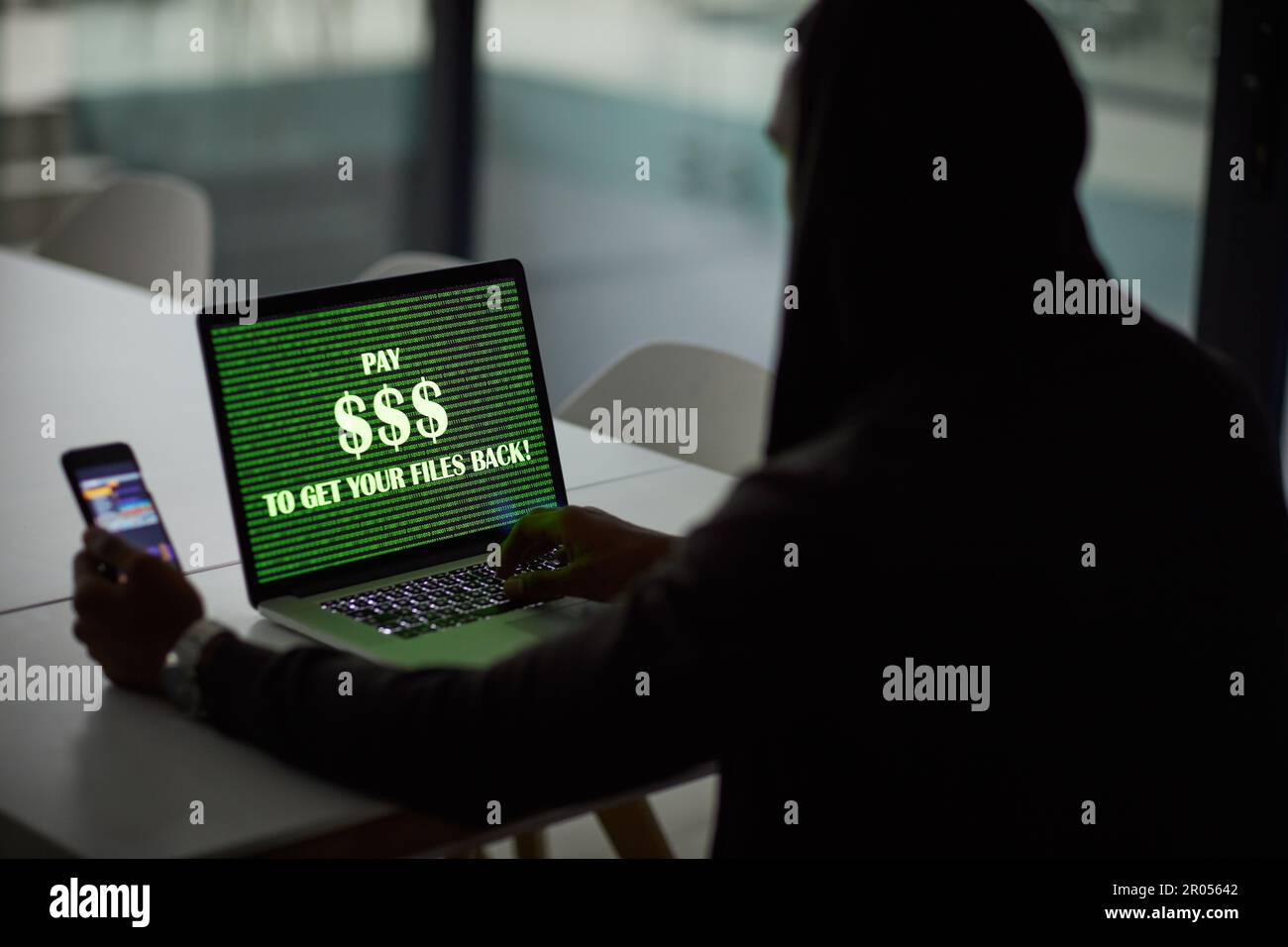 Hacker and phone and back hi-res stock photography and images - Alamy