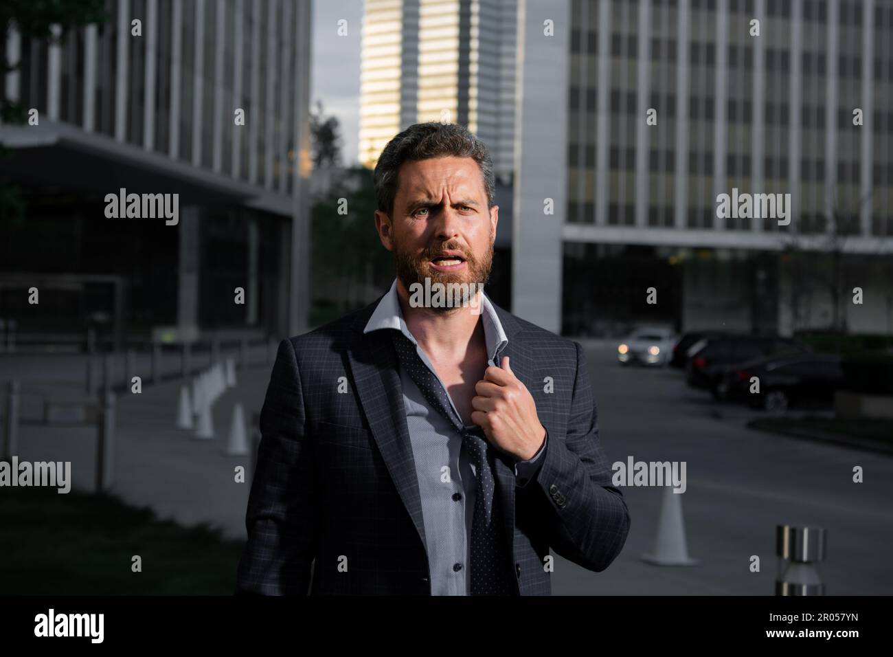 Overworked businessman. Screaming furious business man getting mad. Bad ...