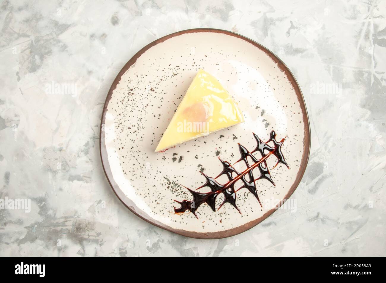 top view yummy cake slice inside plate on white background cookie cake ...