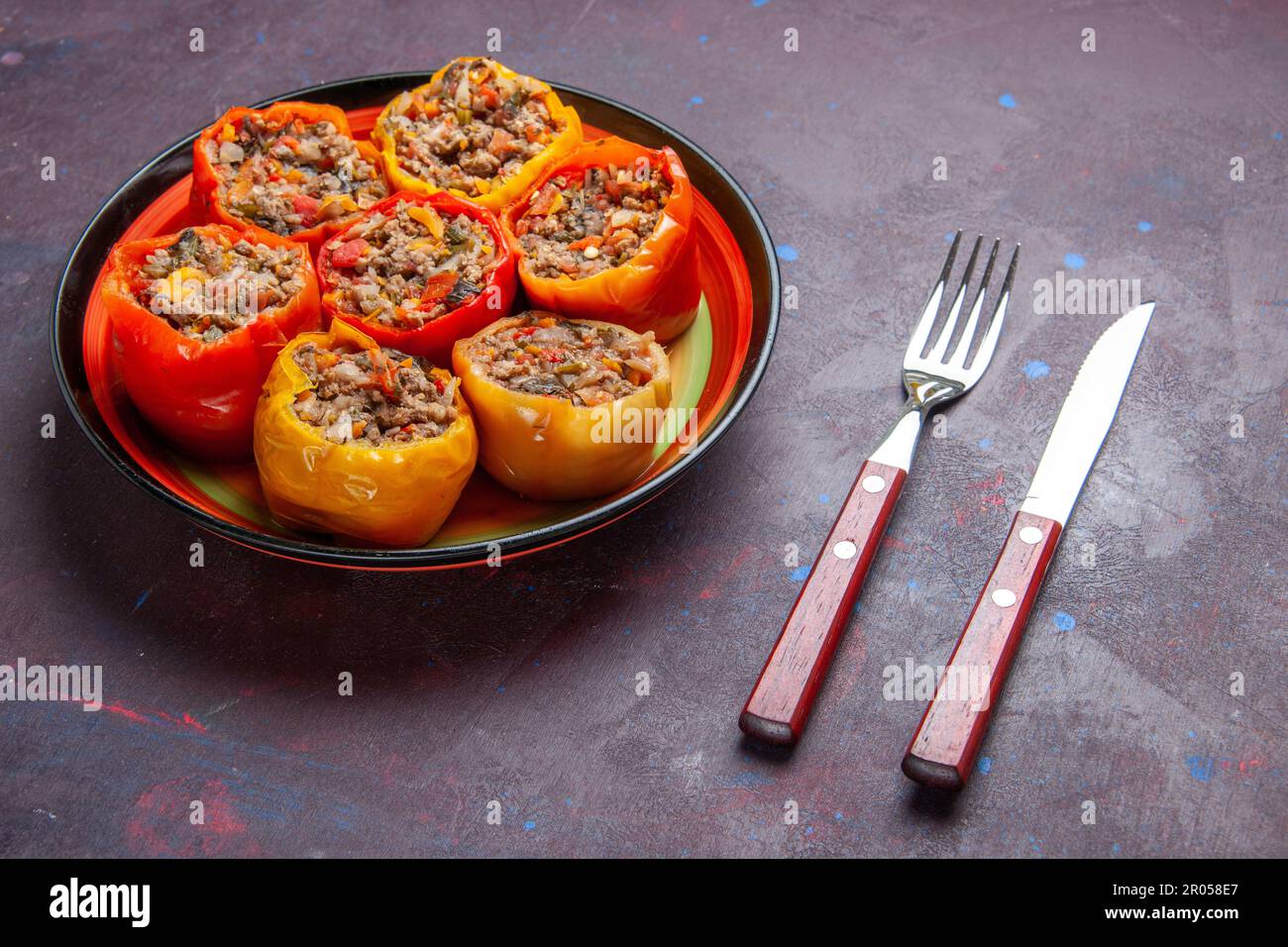front view cooked bell-peppers with ground meat mixed with seasonings ...