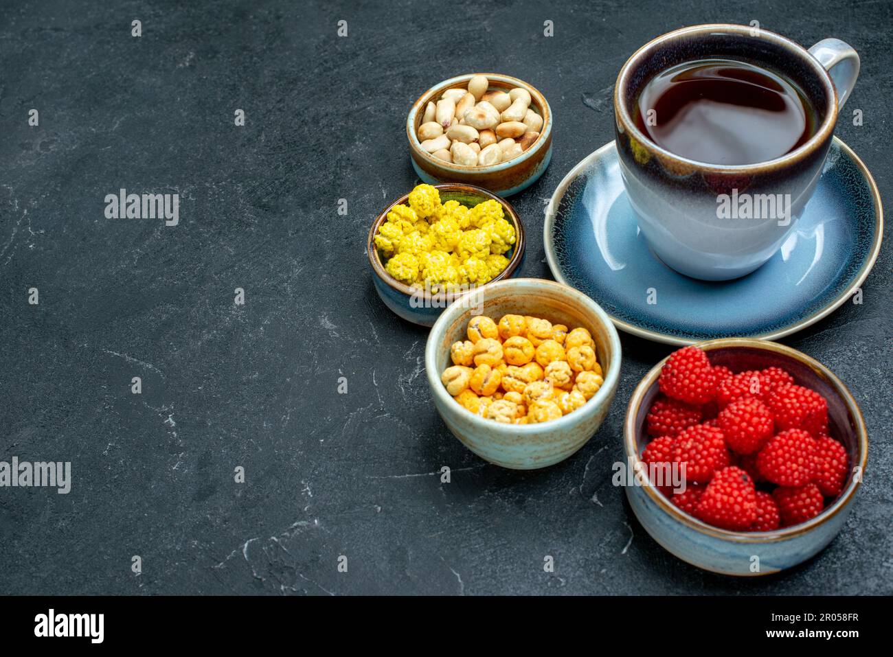 front view cup of tea with candies on grey background candy sugar sweet ...