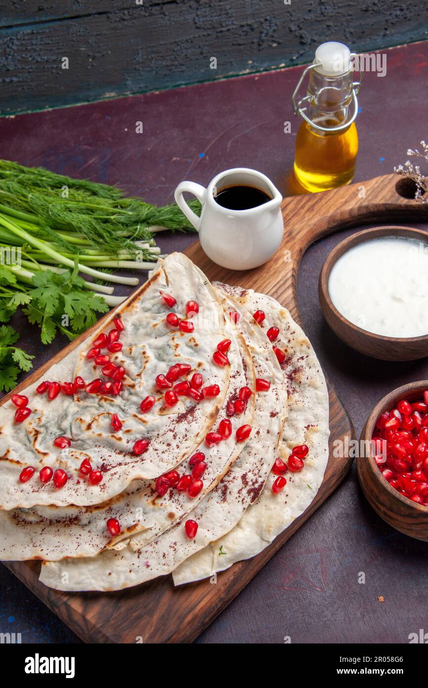 front view delicious qutabs pitas with ground meat inside and with ...