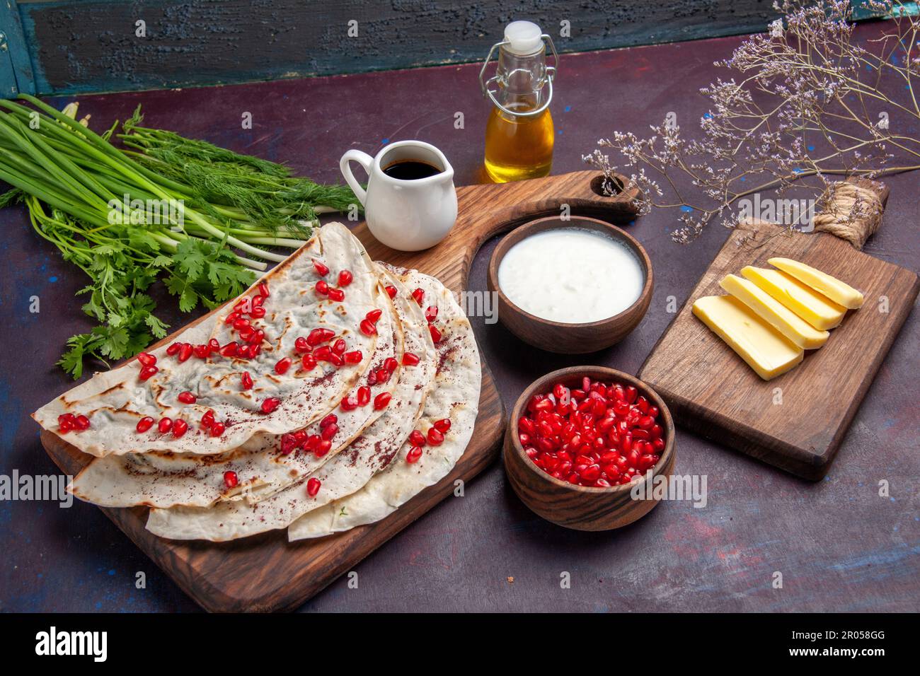 front view delicious qutabs pitas with meat olive oil and fresh ...