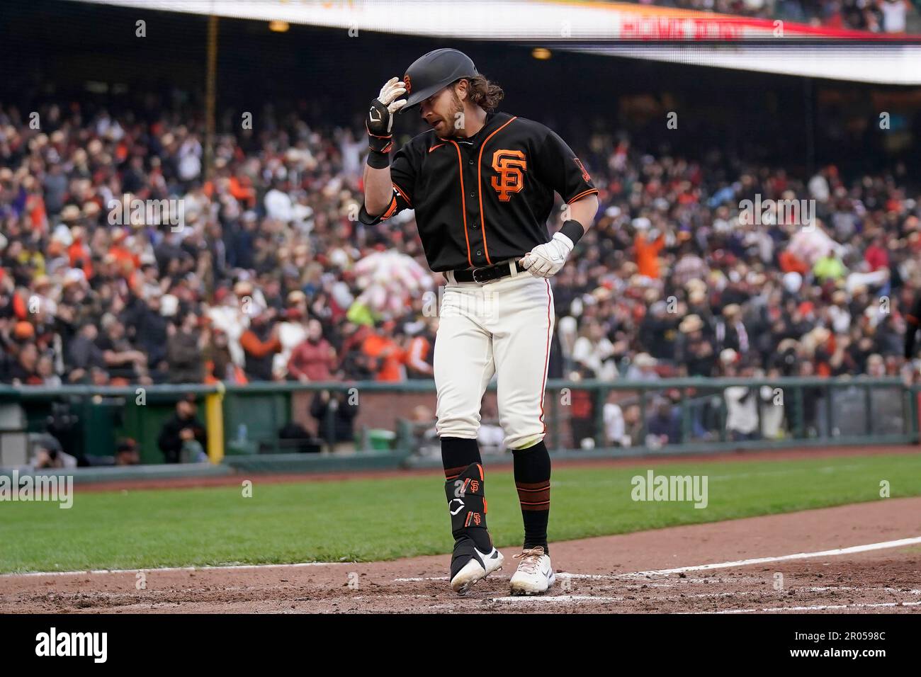 San Francisco Giants' Brett Wisely crosses the plate after hitting a ...
