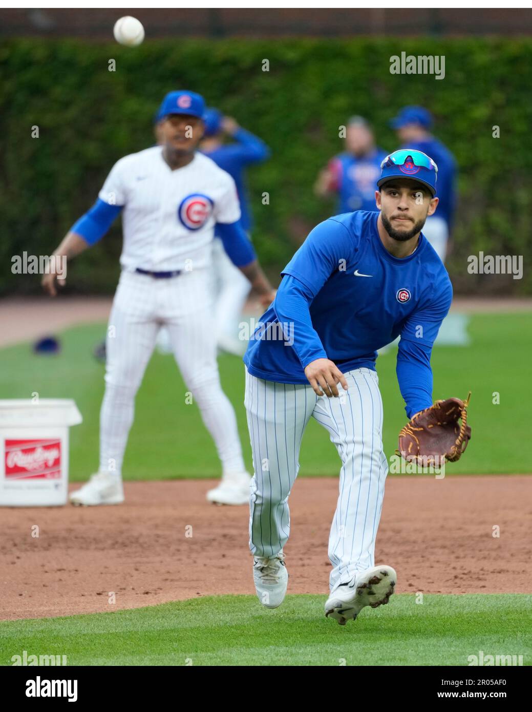Chicago Cubs' Nick Madrigal takes infield practice before a baseball ...