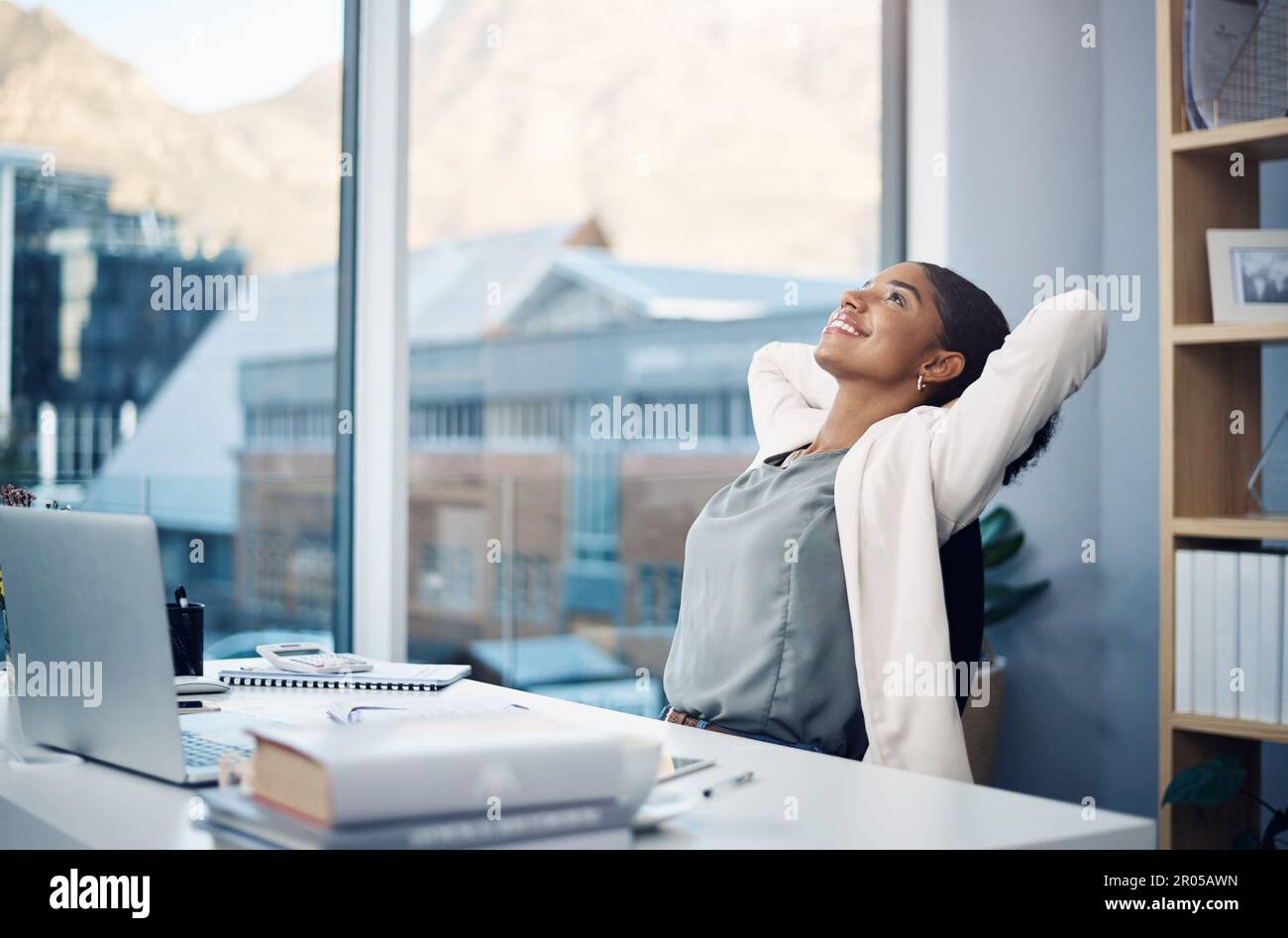 Create a career that feels like a vacation. a young businesswoman ...