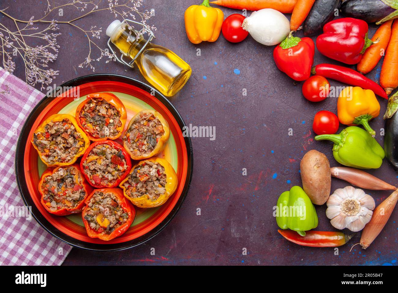 top view cooked bell-peppers with ground meat and fresh vegetables on ...