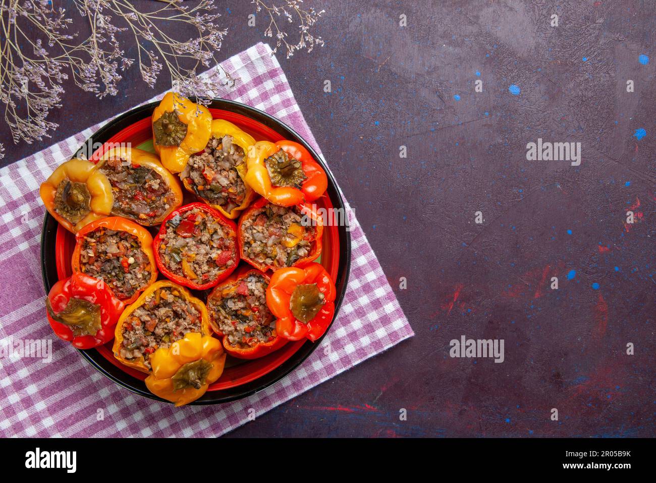 top view cooked bell-peppers with ground meat on a grey desk food beef ...