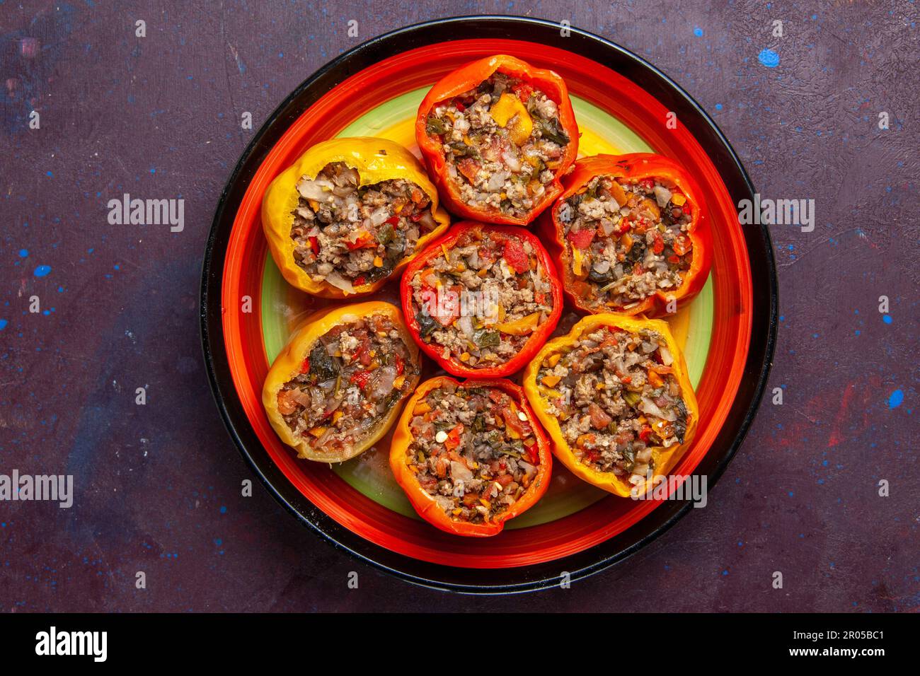 top view cooked bell-peppers with ground meat on grey background food ...
