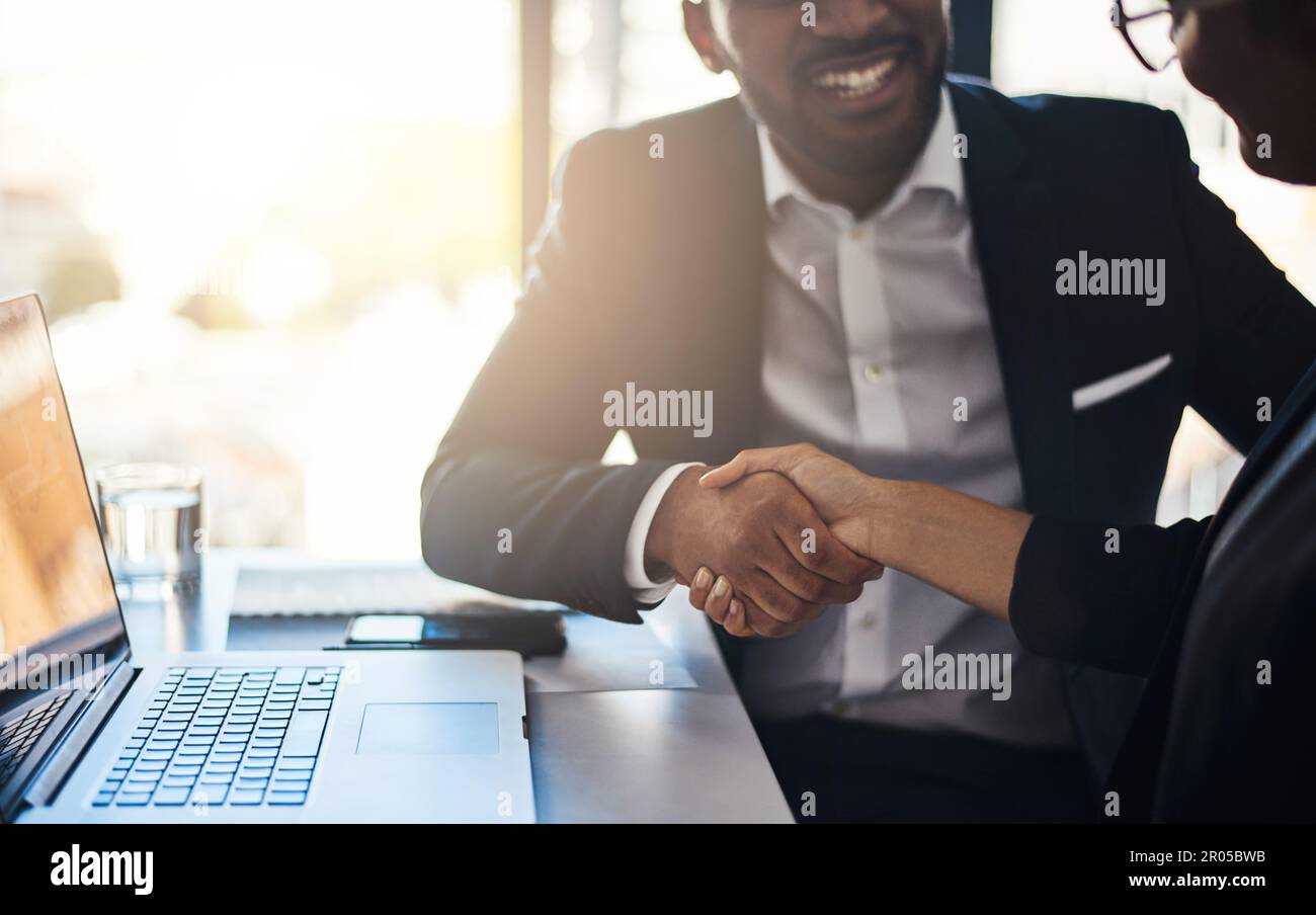 Taking the steps to further their long-term success. two businesspeople ...