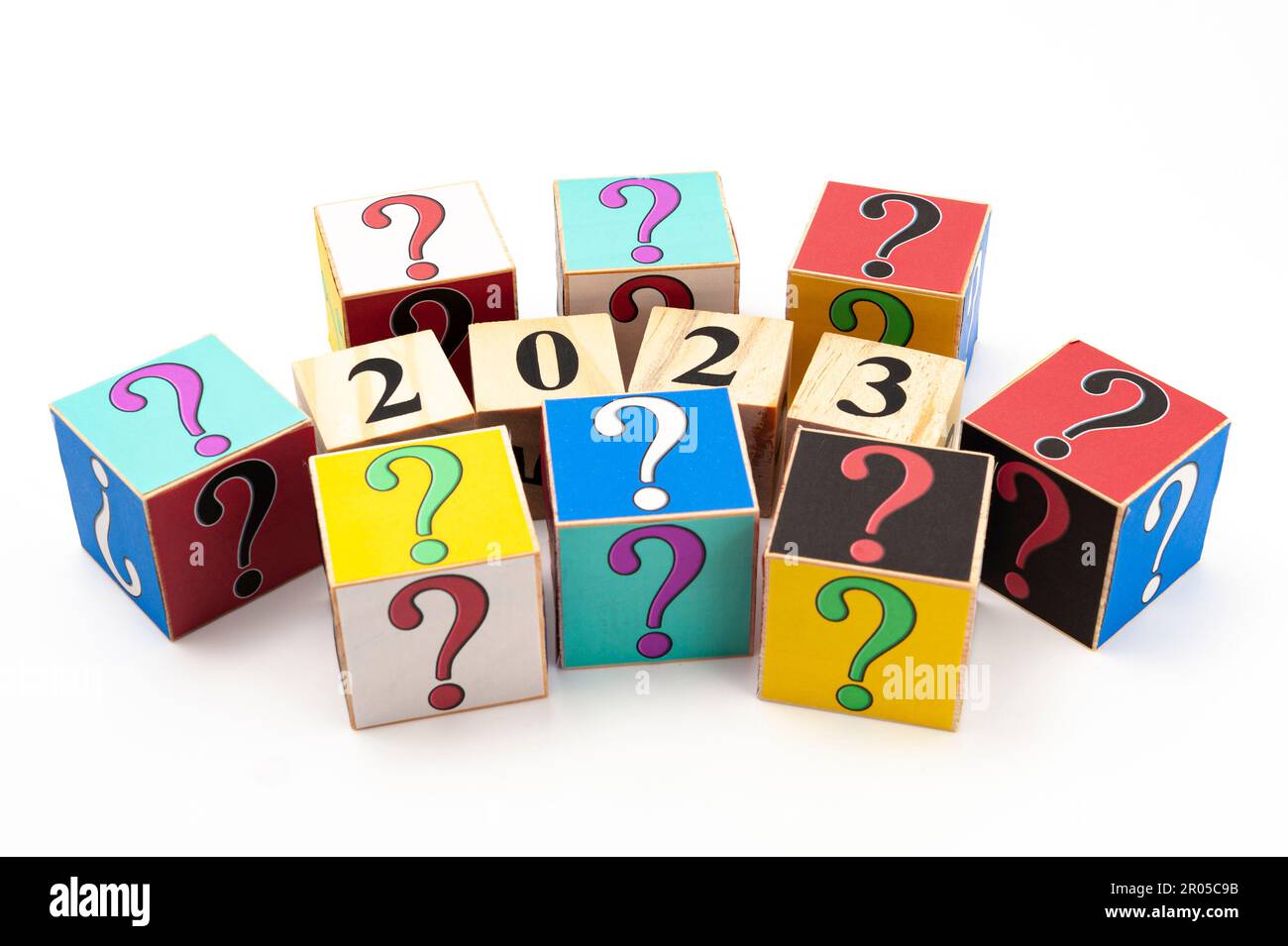 2023 with question mark written on wooden blocks isolated on white ...