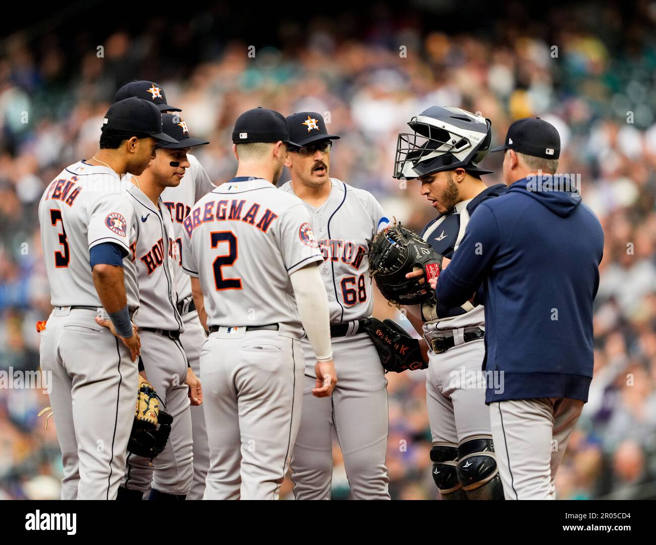 Houston Astros starting pitcher J.P. France is visited on the mound by ...