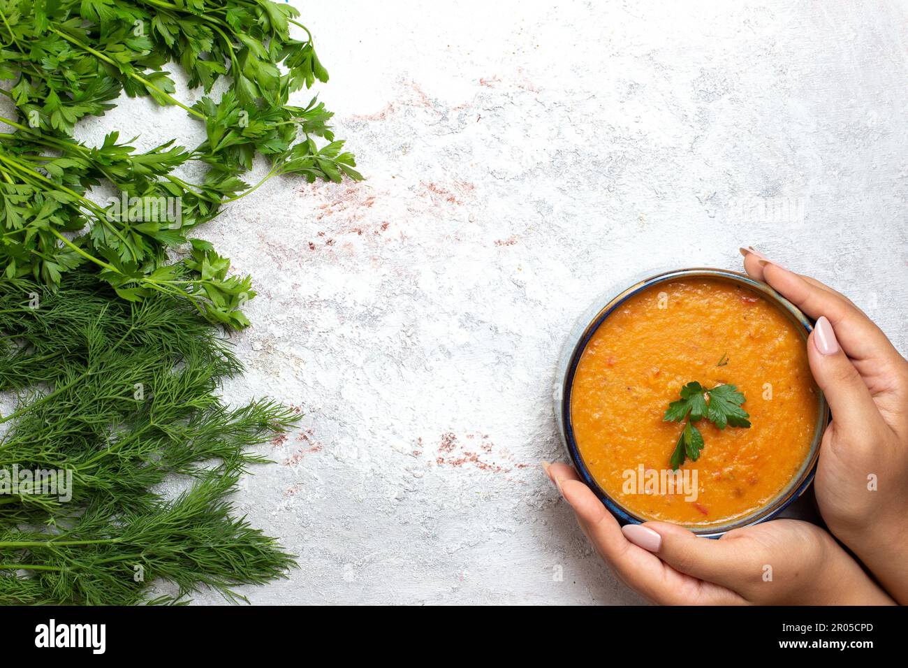 top view fresh greens with bean soup called merci white background ...