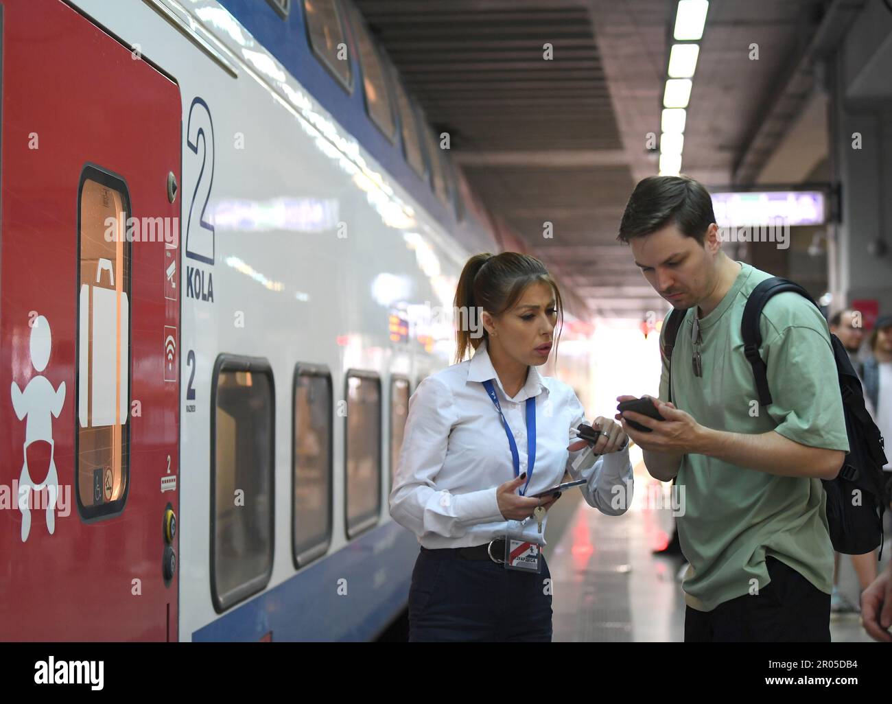 Belgrade. 6th May, 2023. A passenger asks a staff member for help at ...