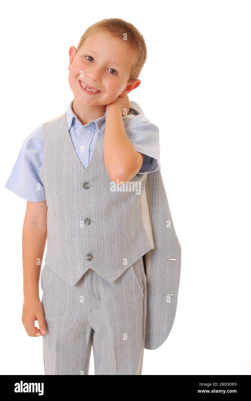 Young boy dressed formally wearing a suit Stock Photo - Alamy