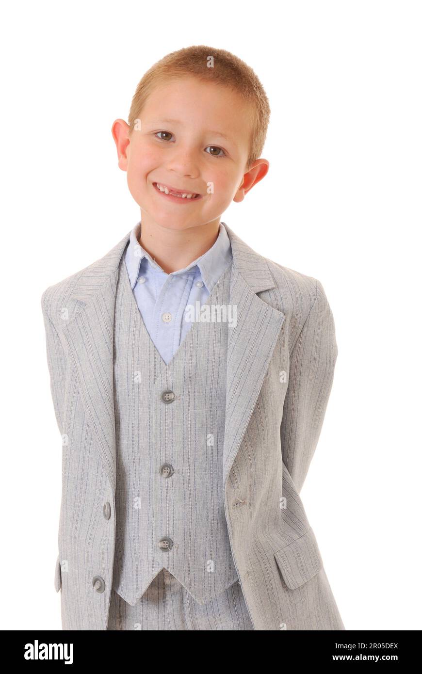 Young boy dressed formally wearing a suit Stock Photo - Alamy