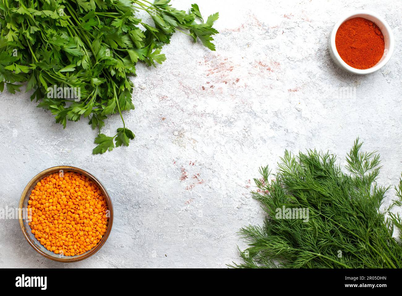 top view raw orange beans called merci with greens on white background ...